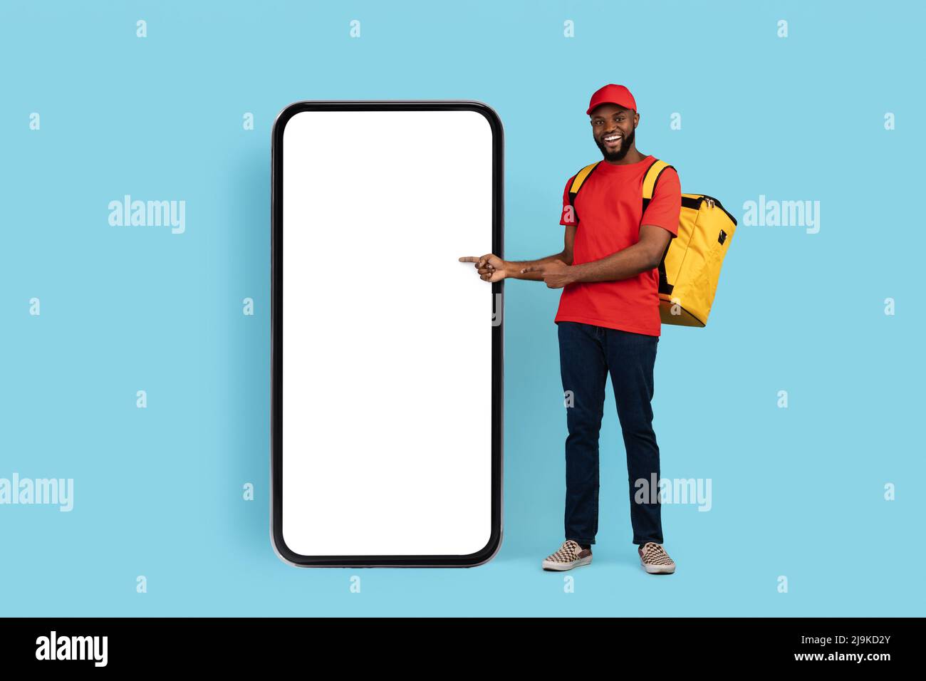 Delivery guy pointing online hi-res stock photography and images - Alamy