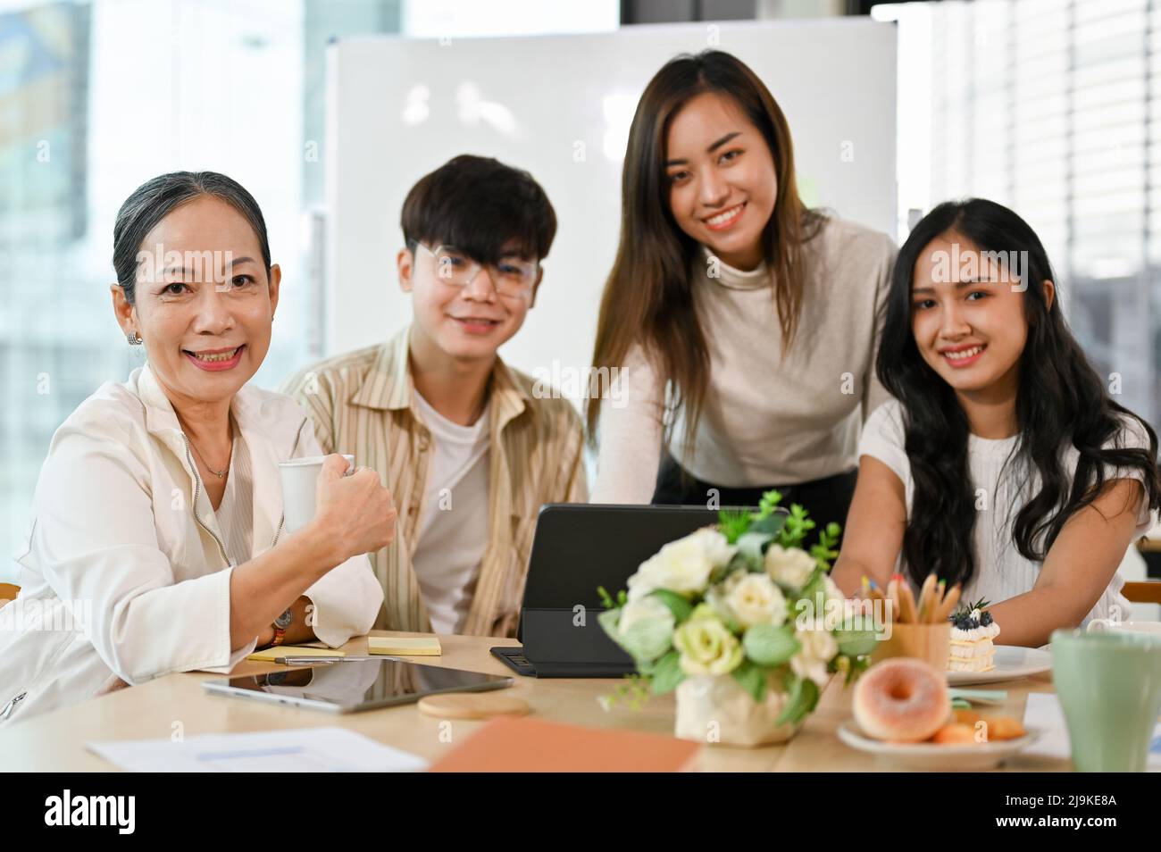 Portrait coworkers group sitting hi-res stock photography and images ...