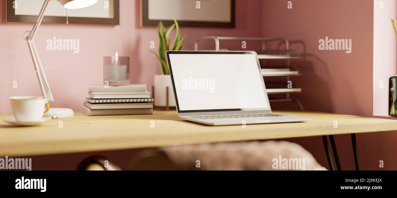 Modern pink feminine home workstation with notebook laptop mockup ...