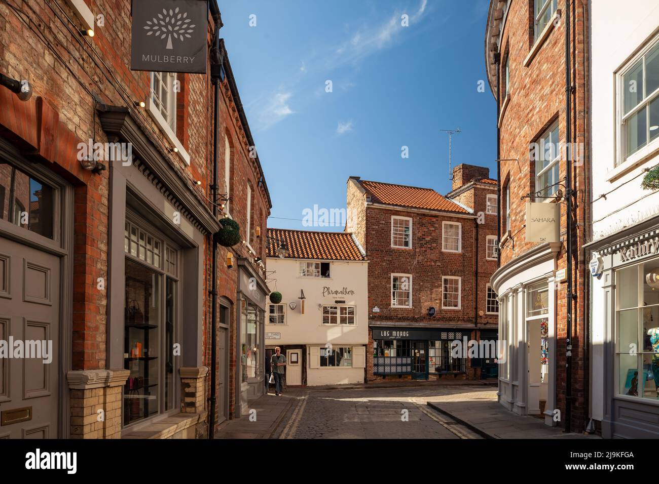 Spring afternoon on Swinegate in York city centre, North Yorkshire ...