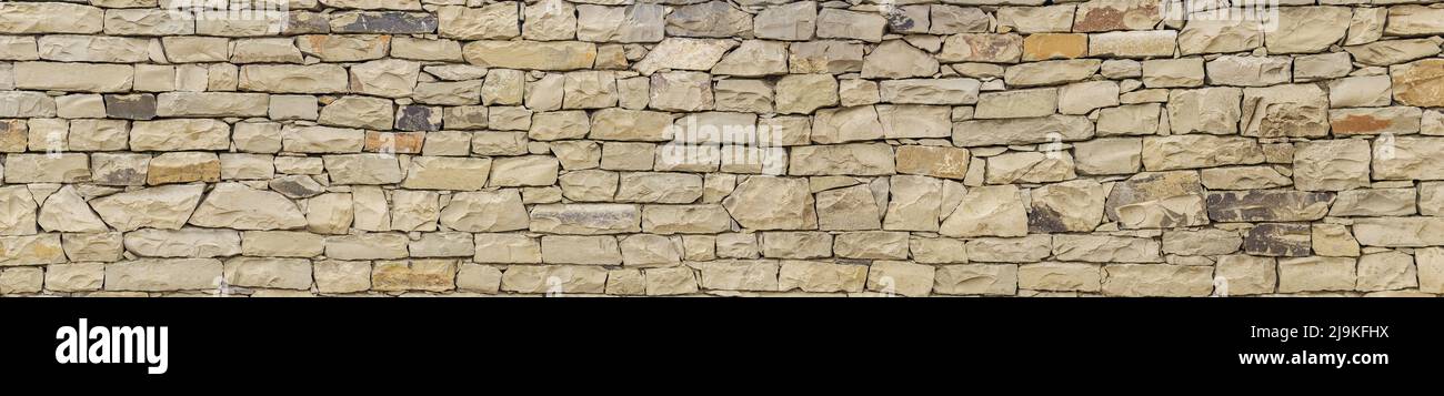 horizontal background, texture - wall of roughly hewn natural light ...