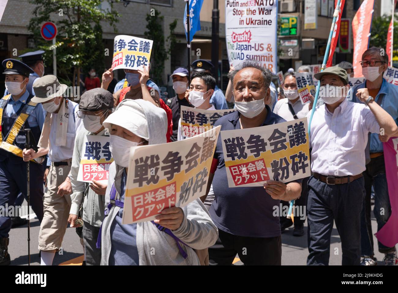 Tokyo, Japan. 24th May, 2022. Protesters chant anti-government slogans ...