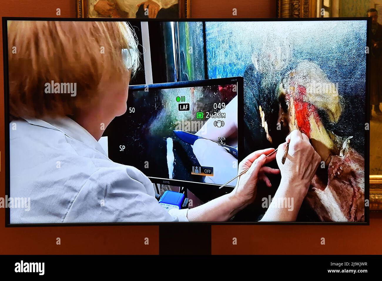 Moscow. The screen with demonstration of restoration works of a picture ...