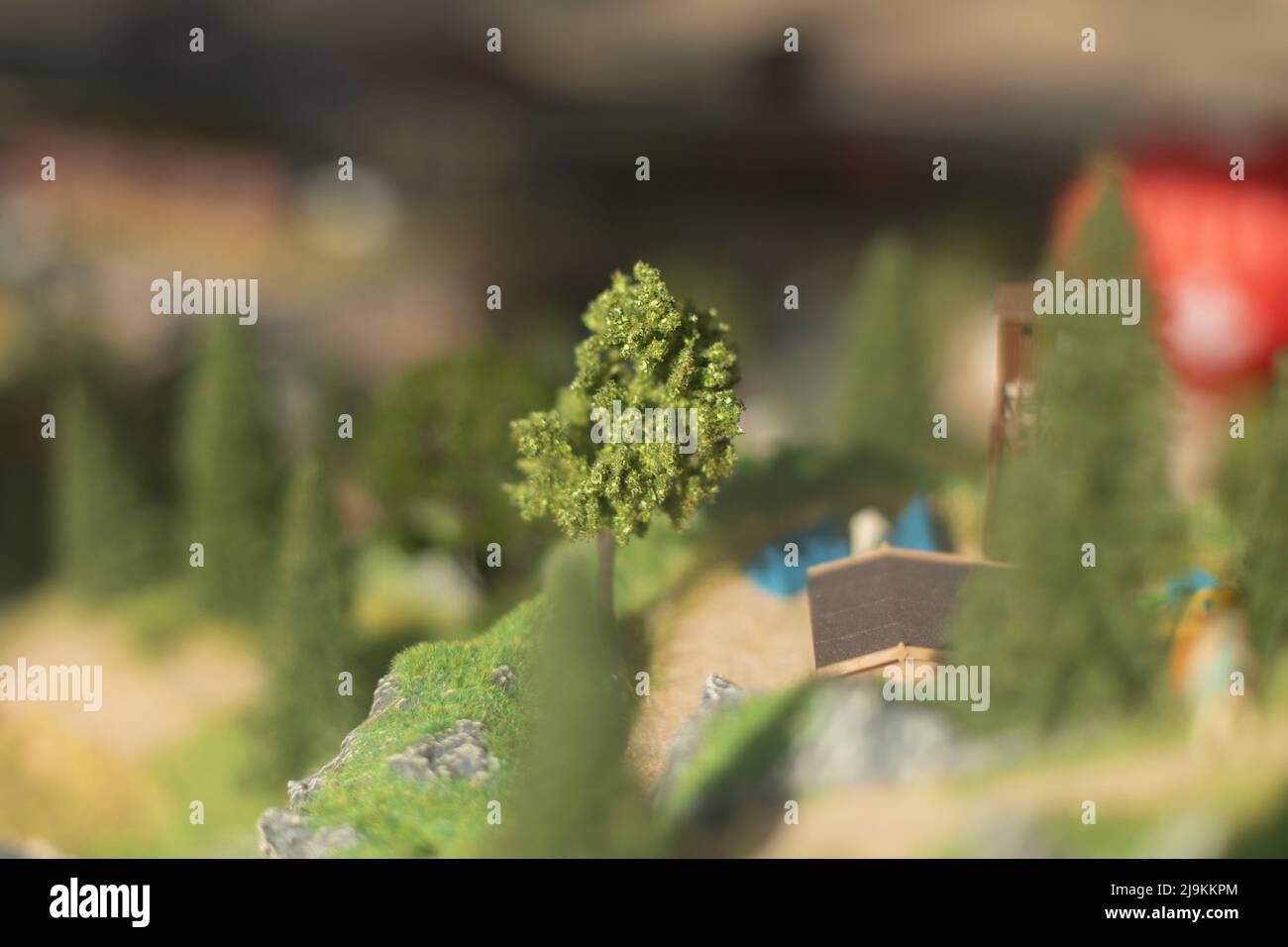 Small trees. Model of mountainous terrain and forests. Toy world ...