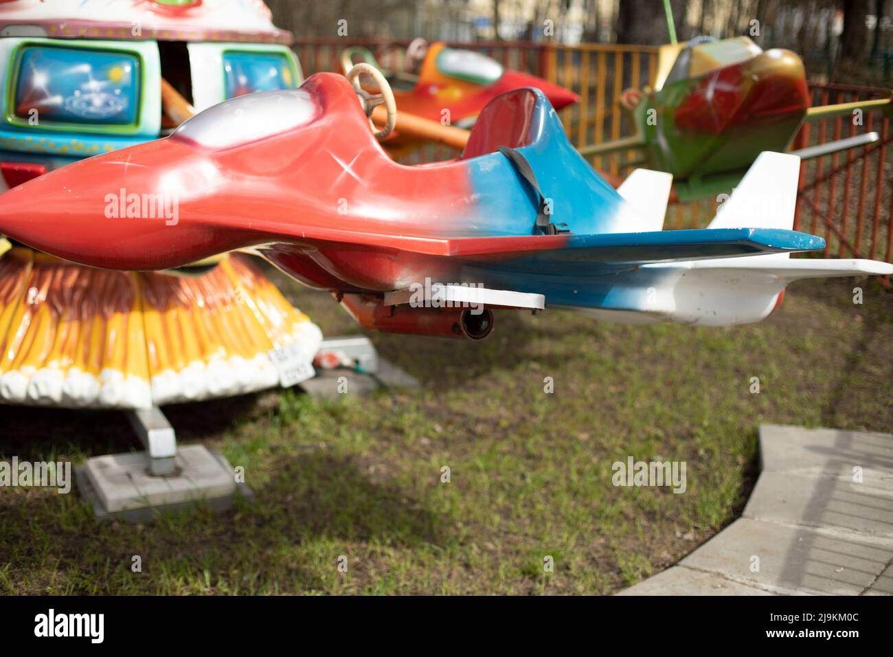 Children's attractions in park. Play plane for kids. Fun place to relax ...