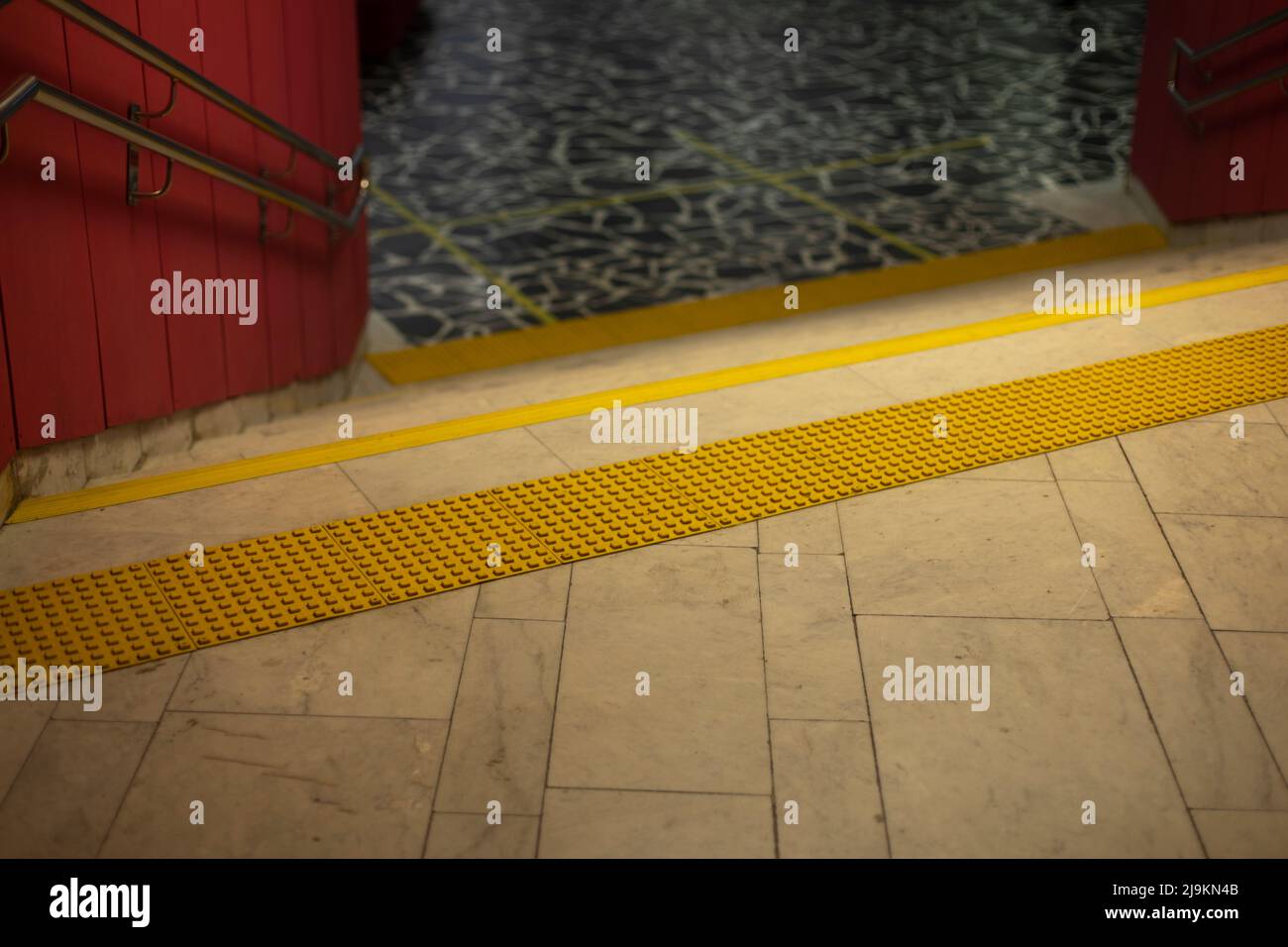 Tactile tiles for visually impaired. Infrastructure details. Steps with ...