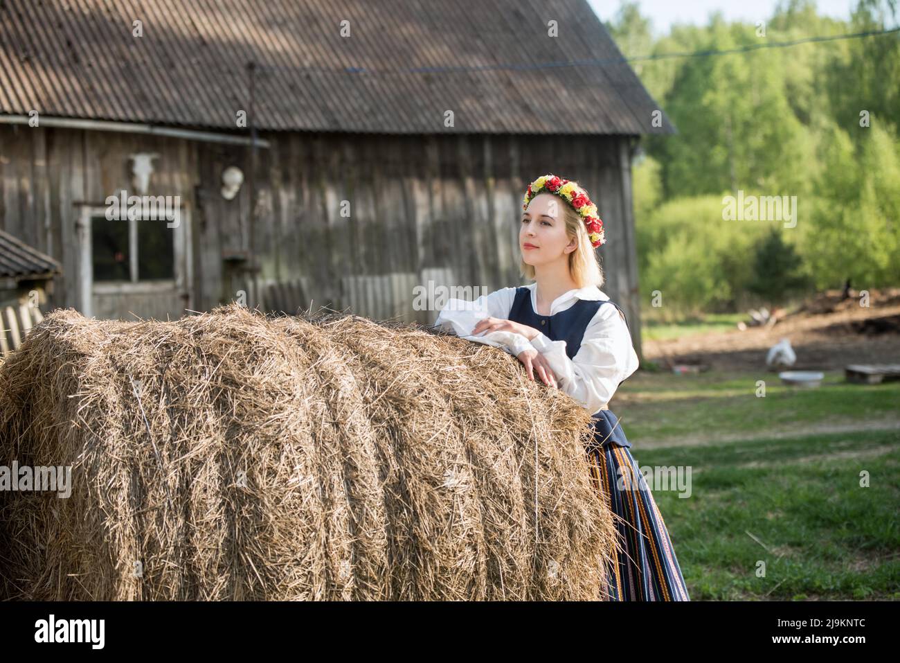 Woman in traditional clothing posing on nature in village Stock Photo ...
