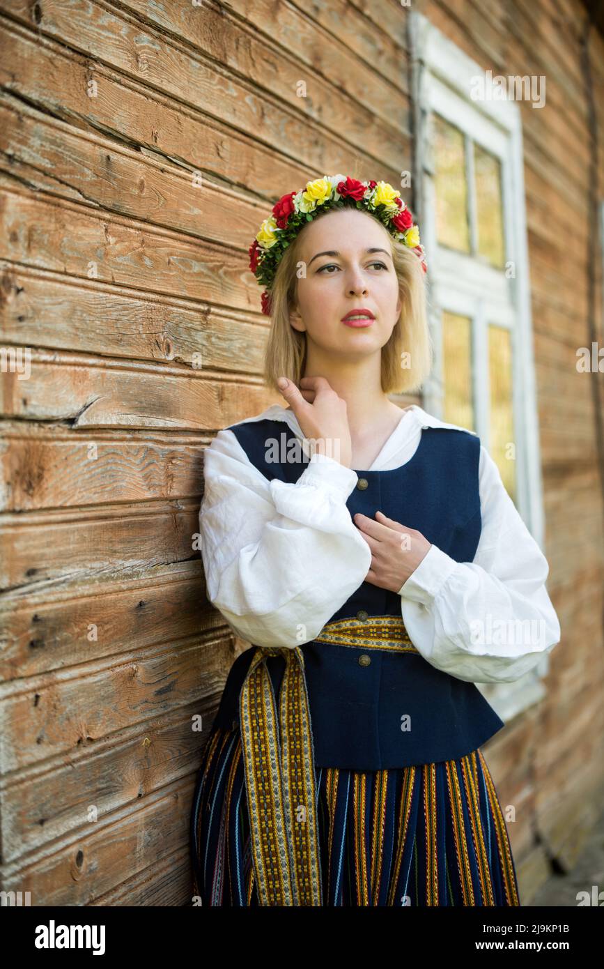 Woman in traditional clothing posing on nature in village Stock Photo ...