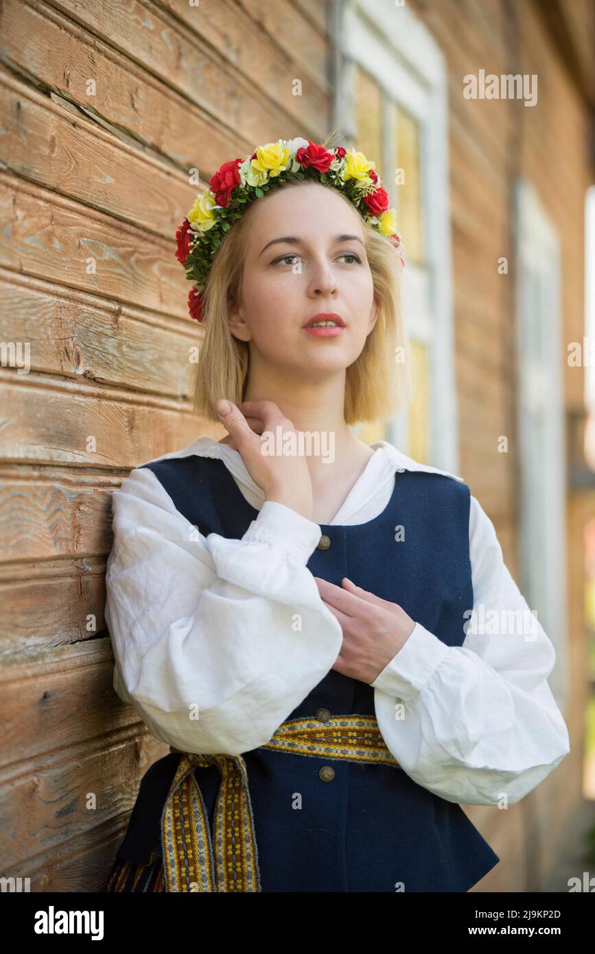 Woman in traditional clothing posing on nature in village Stock Photo ...