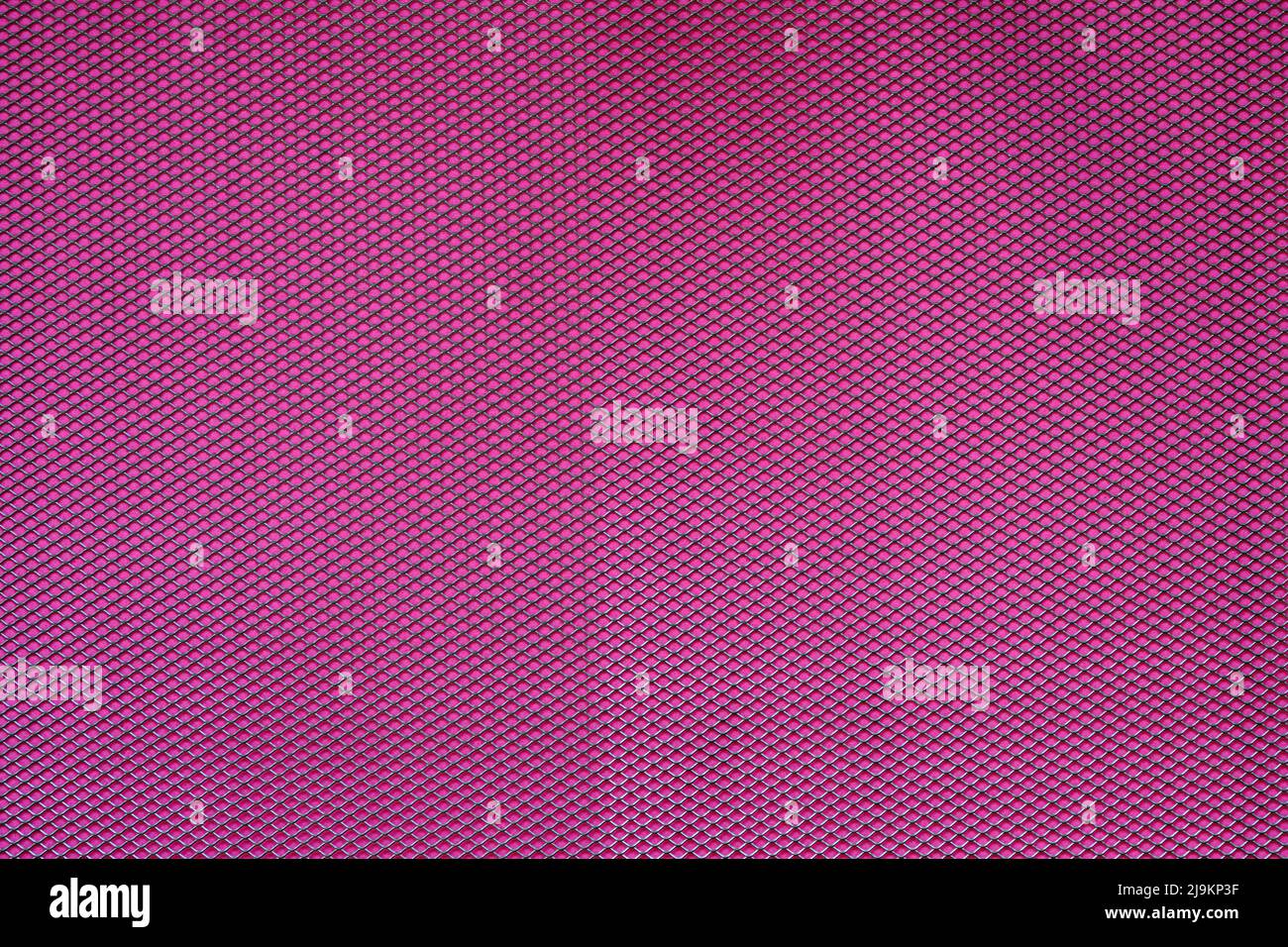 Abstract closeup of metallic background with pink color background ...