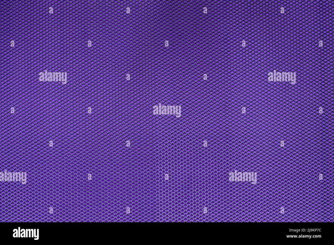 Abstract closeup of metallic background with purple color background ...