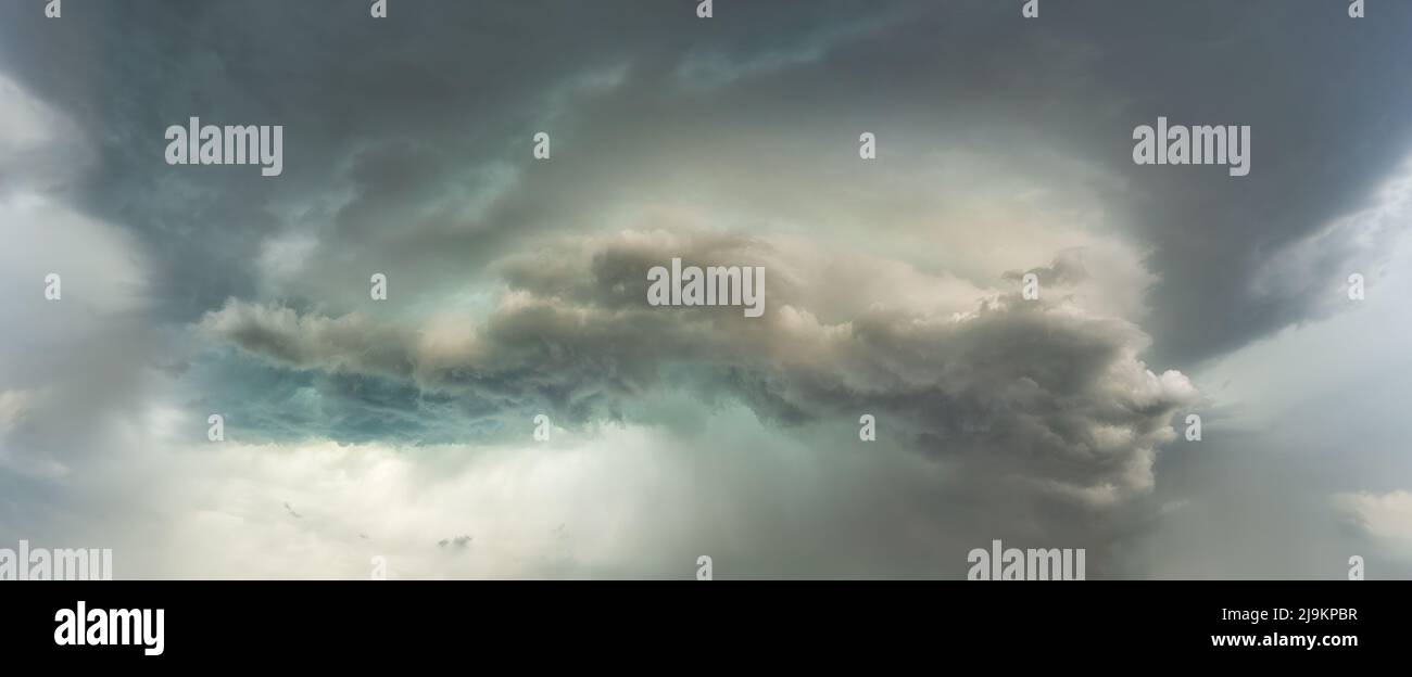 dramatic storm with stormy clouds and rain on sky Stock Photo - Alamy