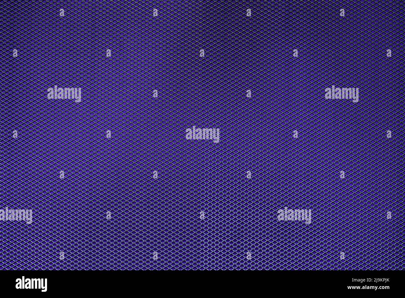 Abstract closeup of metallic background with purple color background ...