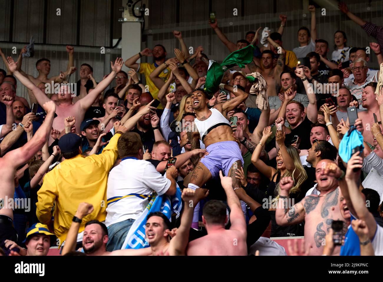 Leeds United's Raphinha celebrates in the crowd with fans during the ...