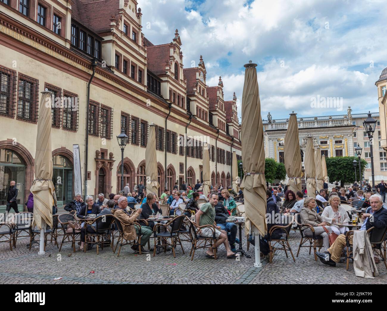 People in cafes by Leipzig's renaissance old town hall (Altes Rathaus ...