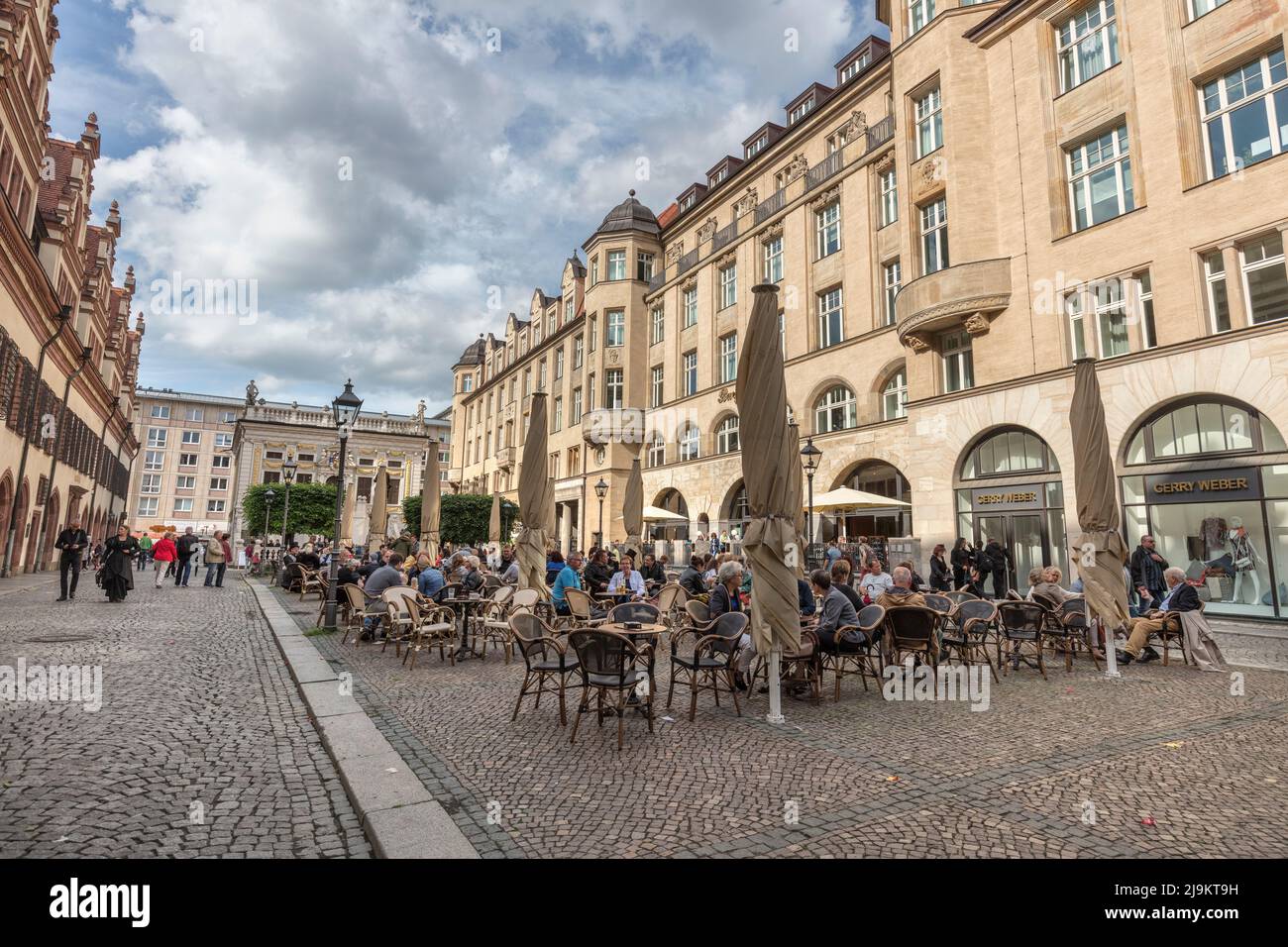 People in cafes by Leipzig's renaissance old town hall (Altes Rathaus ...