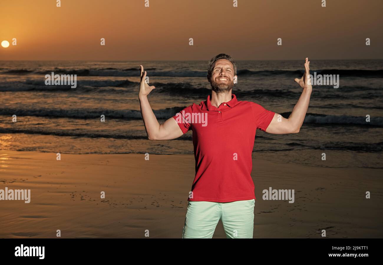 happy successful man over the sea on sunset summer beach, success Stock ...