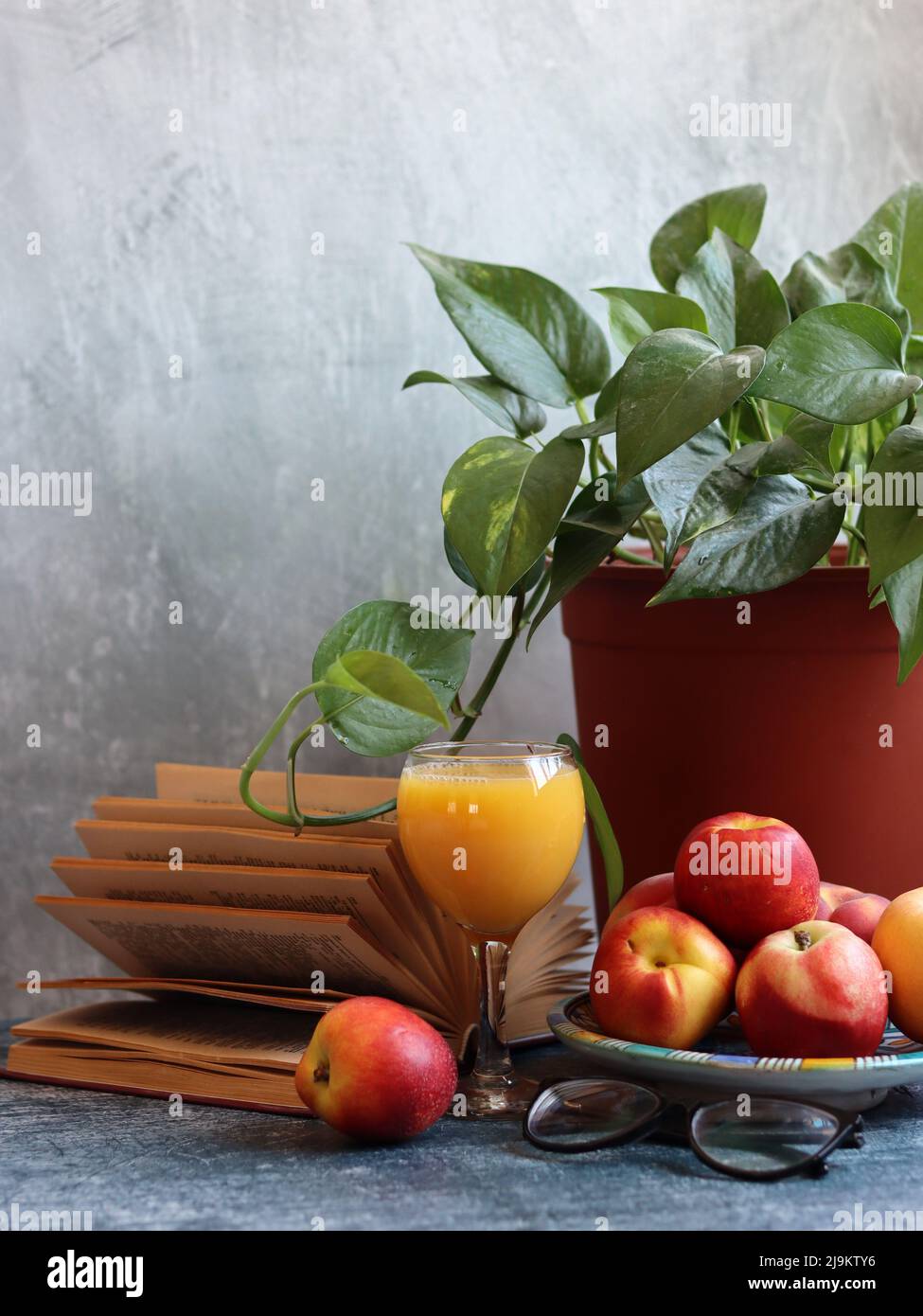 Still life with fresh organic fruit. Close up photo of nectarines and ...