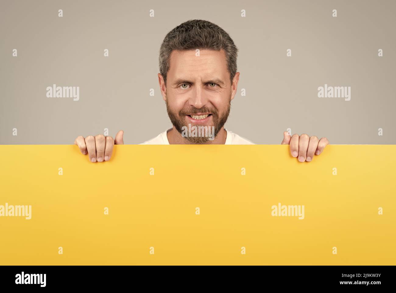 happy man with copy space for advertisement. guy advertising ...