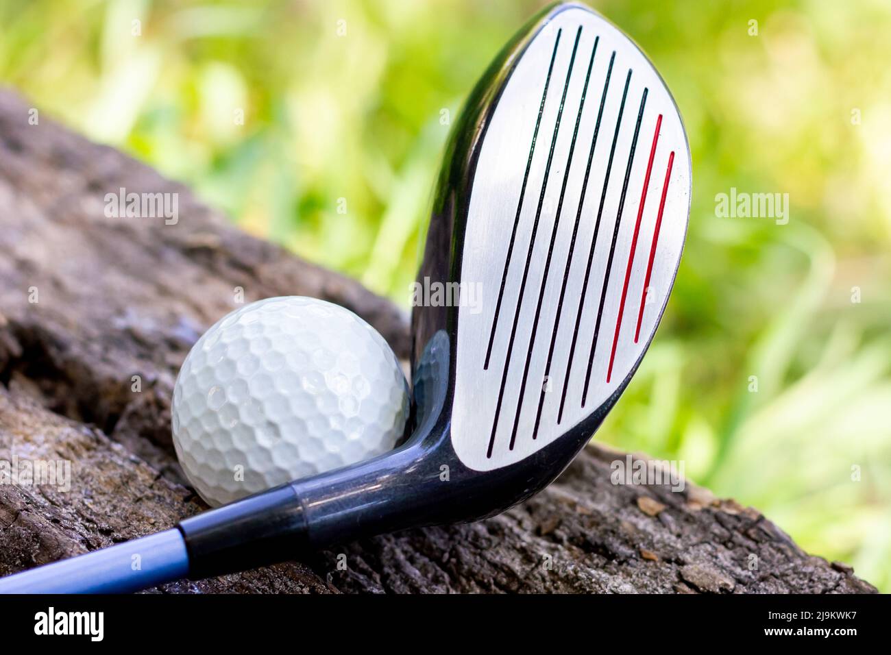 Titanium golf club. Equipment for playing golf. Golf ball Stock Photo ...
