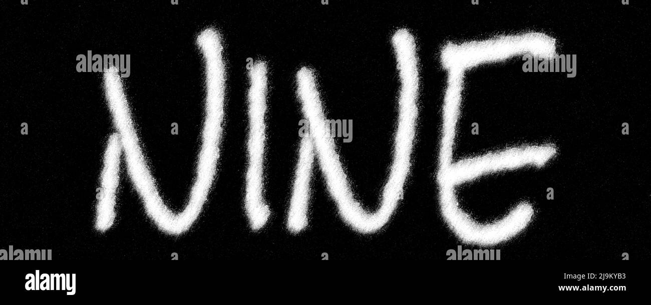 Black plate with the white word "NINE" written with chalk Stock Photo ...