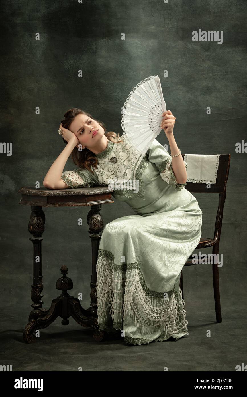 Conceptual portrait of young charming girl in image of medieval royal ...