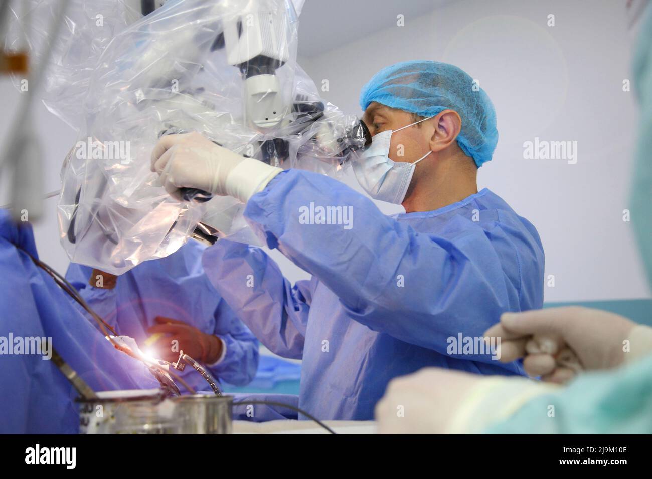 Treatment of a brain aneurysm. Surgical operation on the brain. A team ...