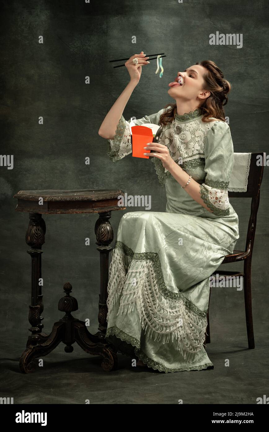 Conceptual portrait of young charming girl in image of medieval royal ...