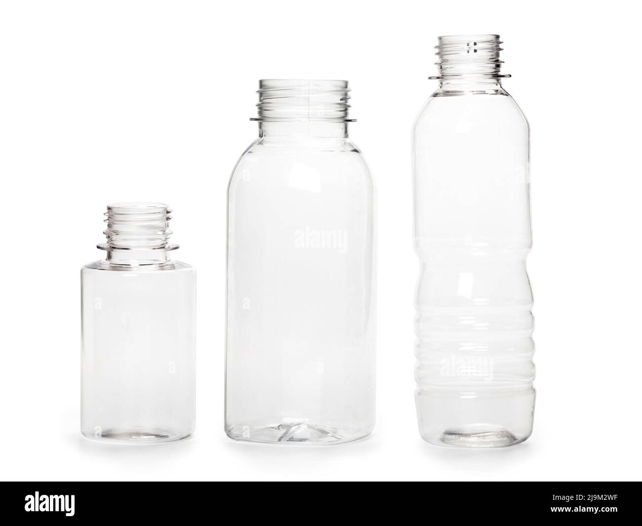 three different empty plastic bottles isolated on white background ...