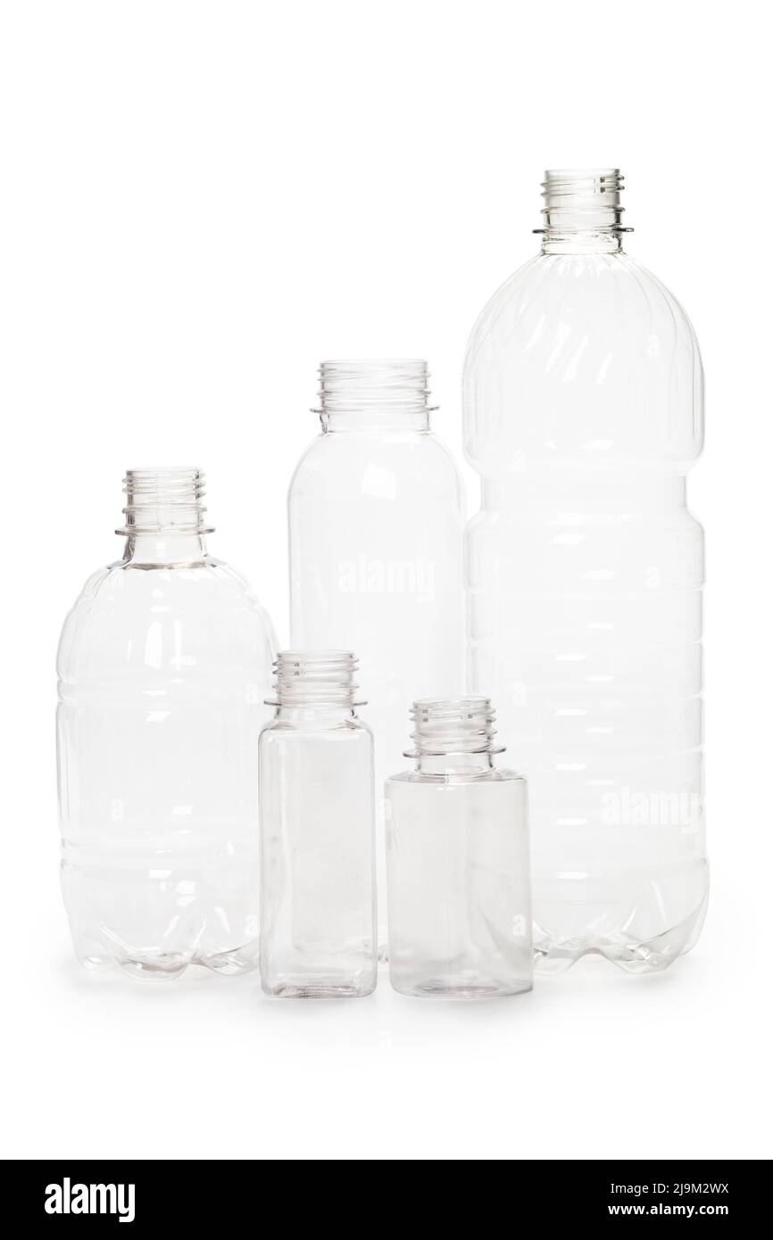many different empty plastic bottles isolated on white background ...
