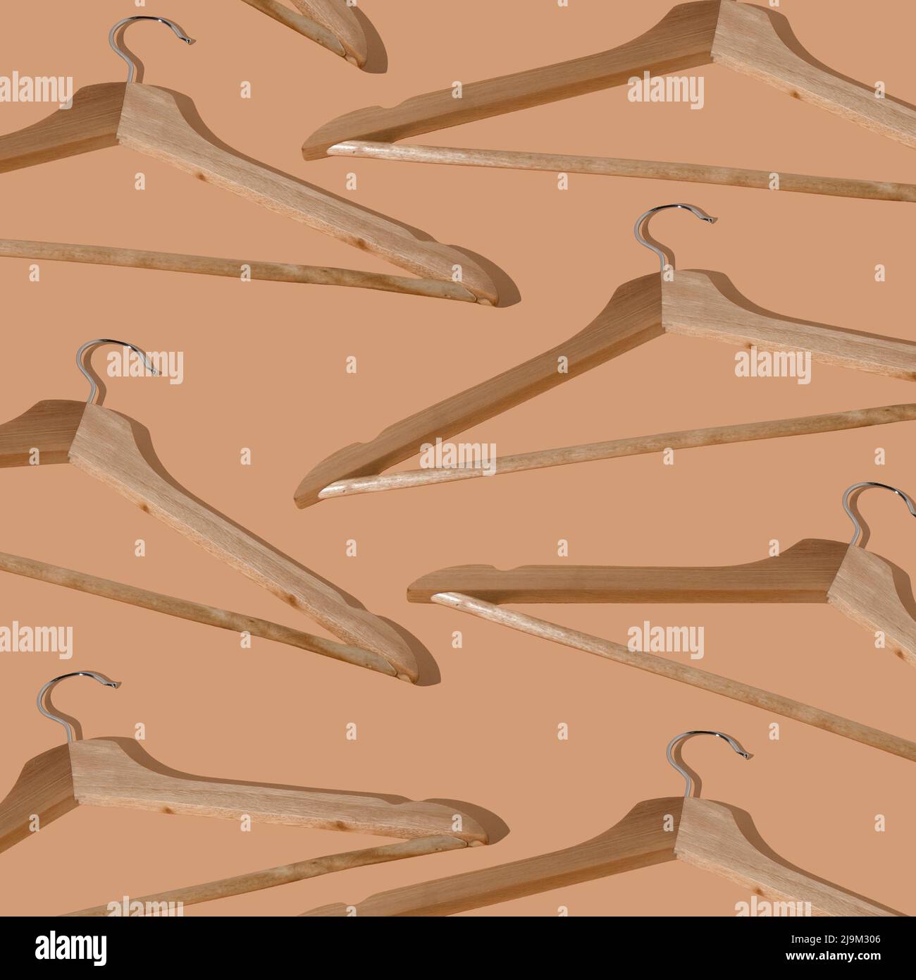 Pattern hangers for clothes. Hanger set. Beige background copy space ...