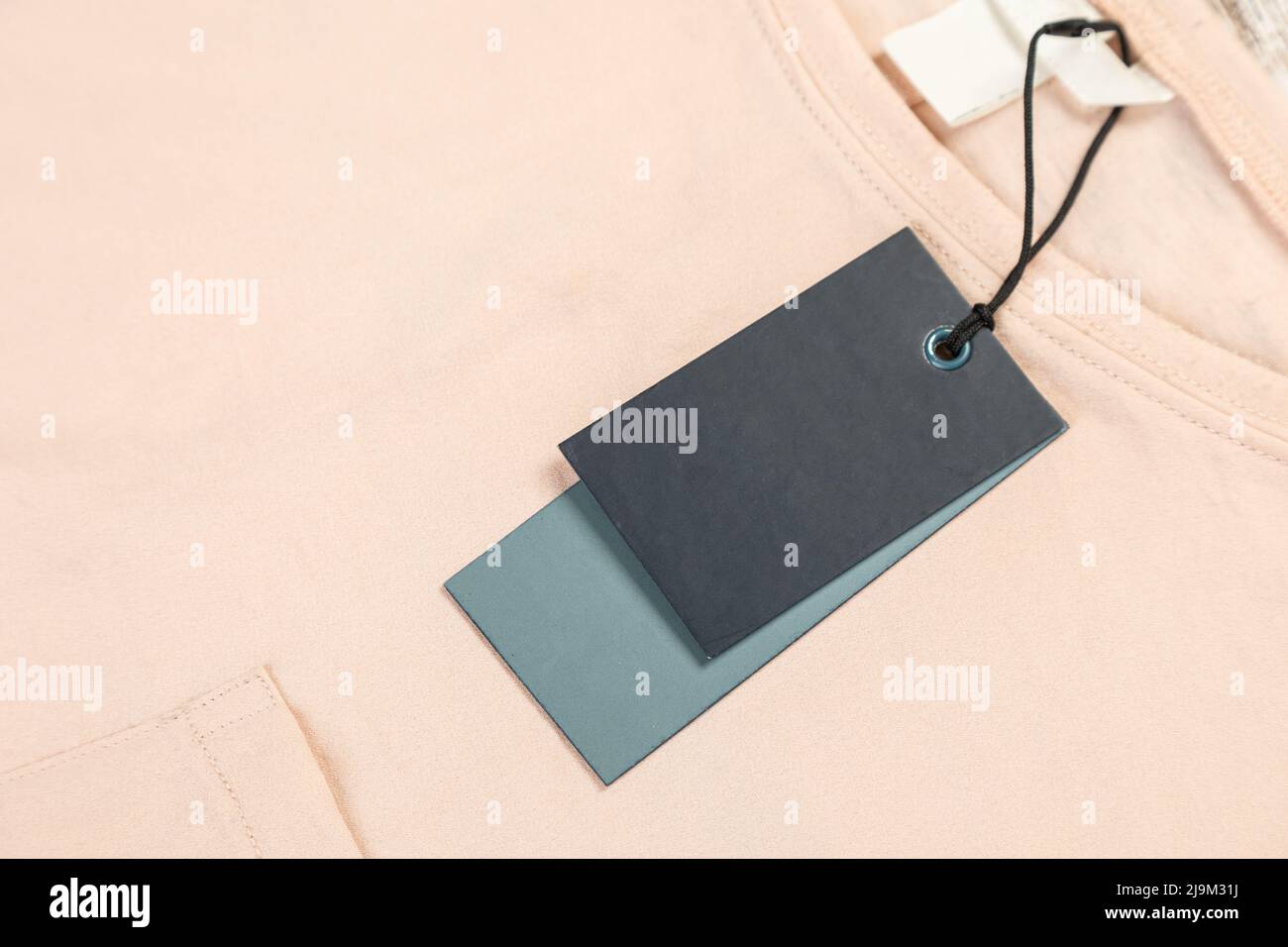 Plain clothing price tag close up place for your text or logo Stock ...