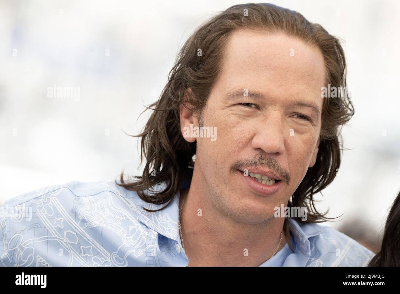 Reda Kateb attends the photocall for Nos Frangins during the 75th ...