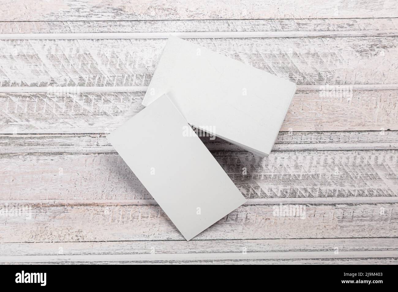 Business cards blank. Mockup on gray wooden background. Copy space for ...