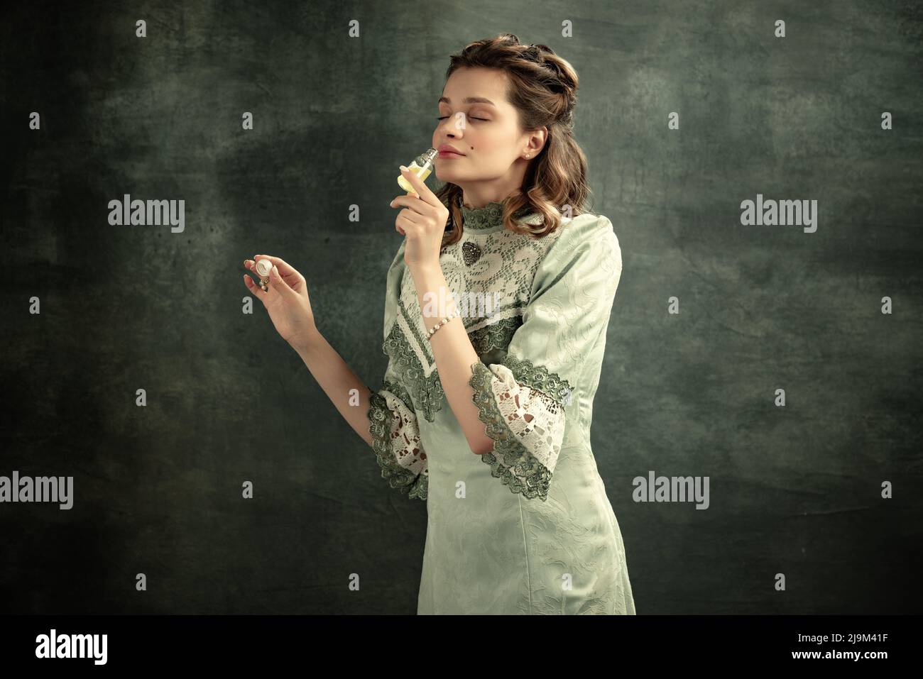 Conceptual portrait of young charming girl in image of medieval royal ...