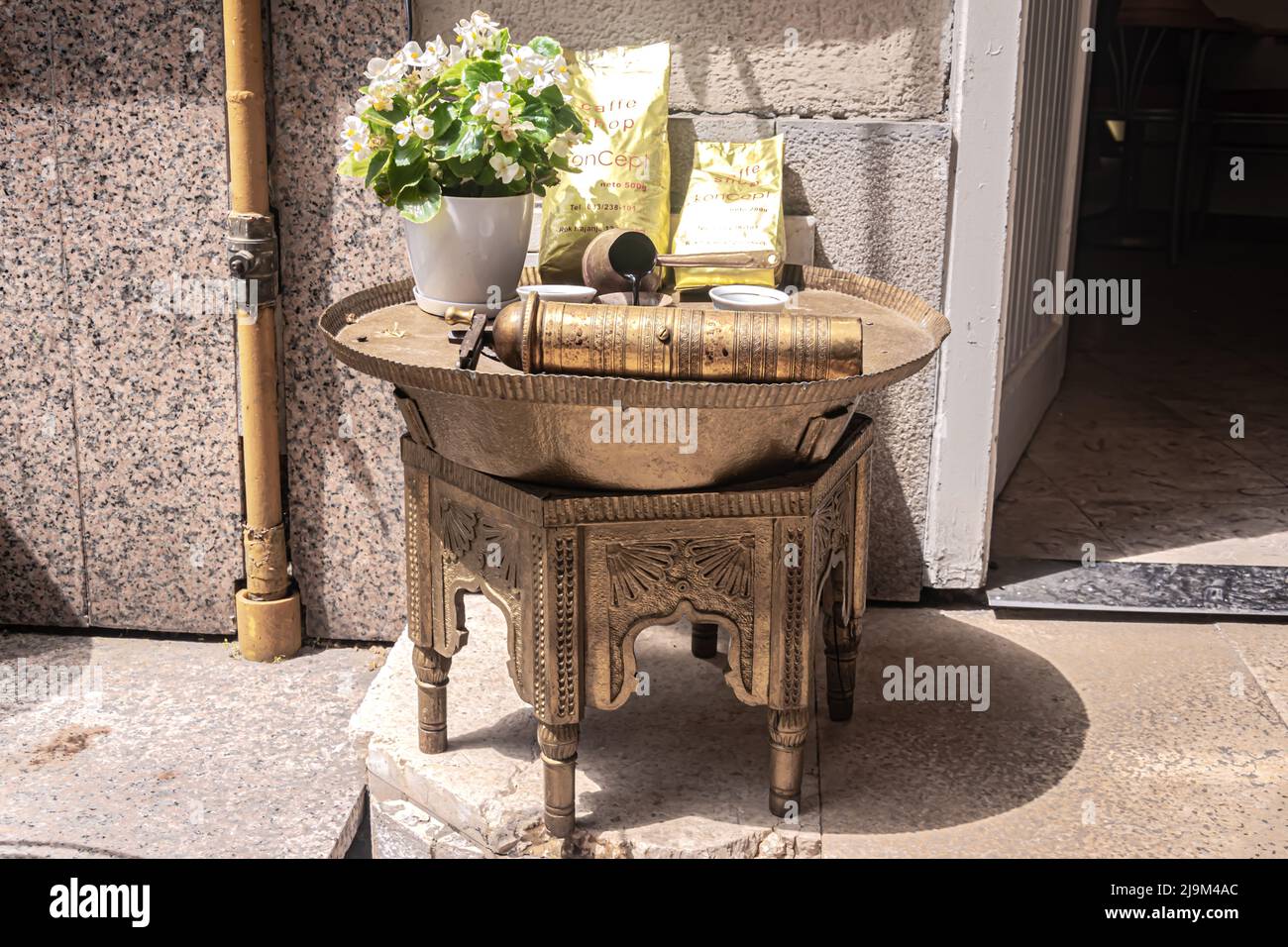 The pouring Bosnian coffee fountain Stock Photo - Alamy