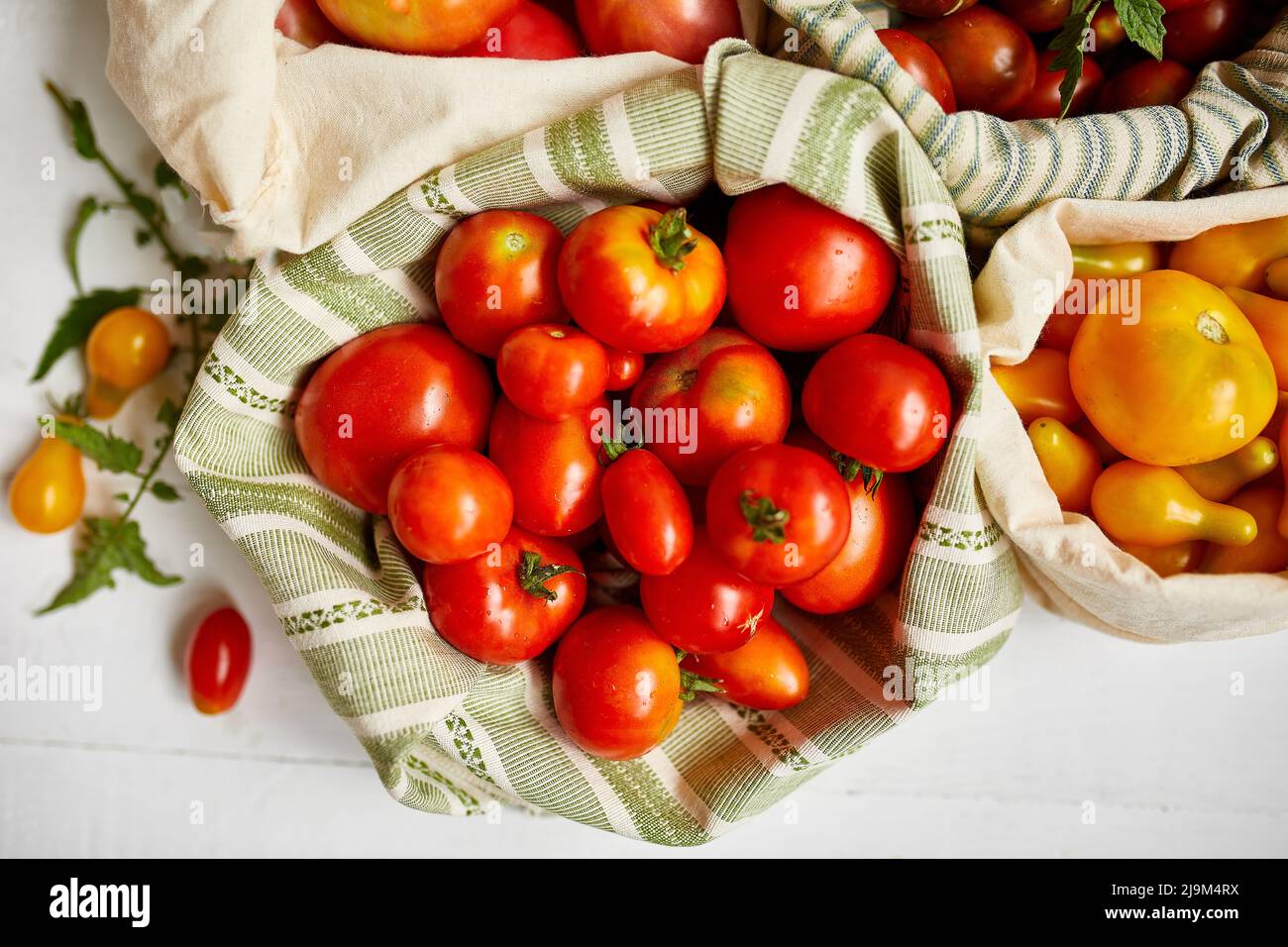 Market delivary of Different kinds of tomatoes in eco textile bag, Zero ...
