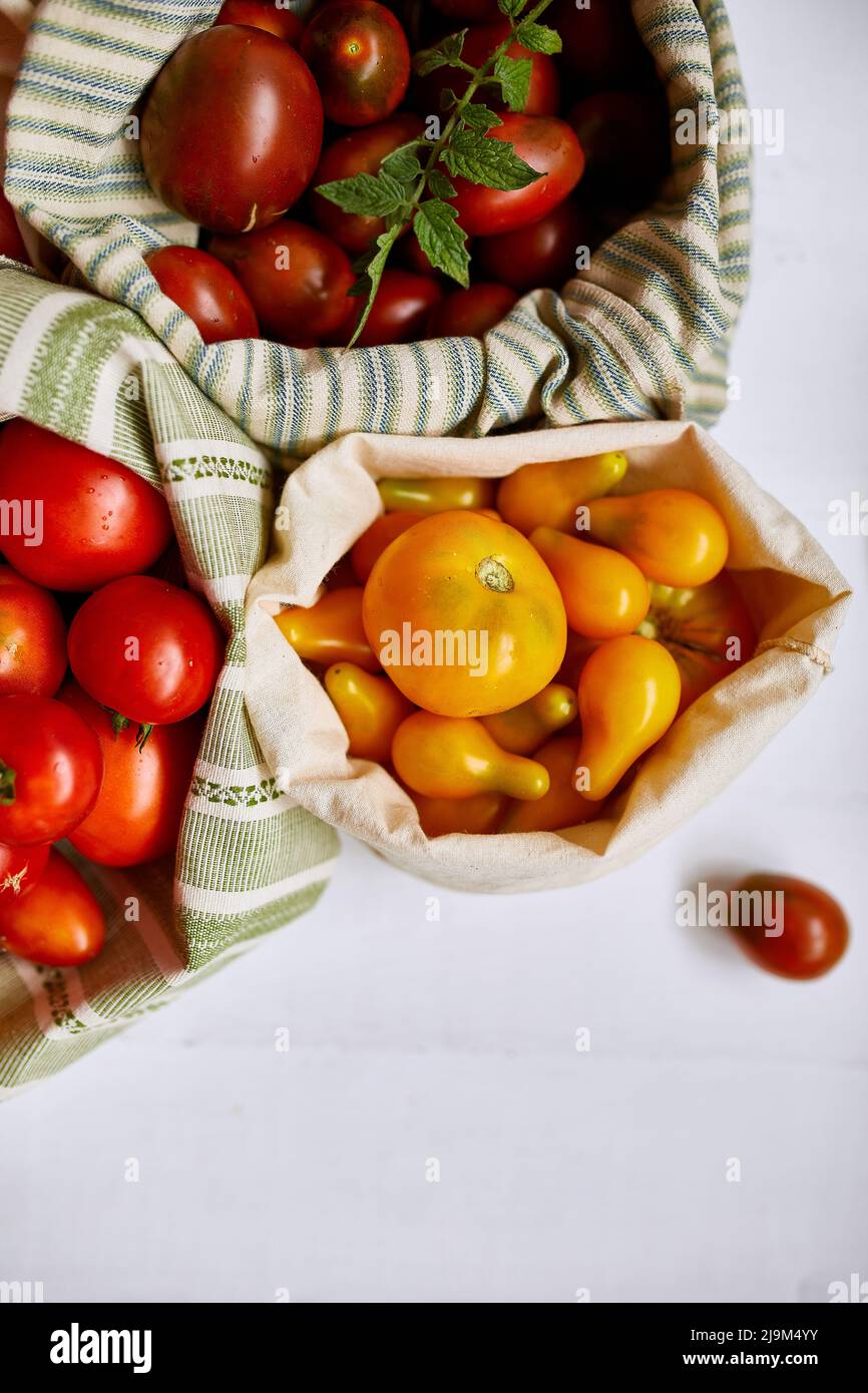 Market delivary of Different kinds of tomatoes in eco textile bag, Zero ...