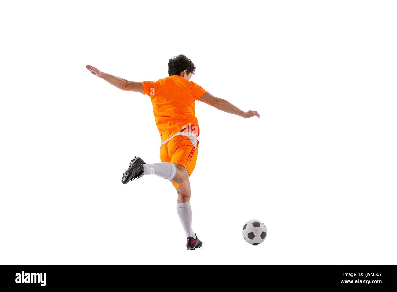 Professional football, soccer player in motion isolated on white studio ...