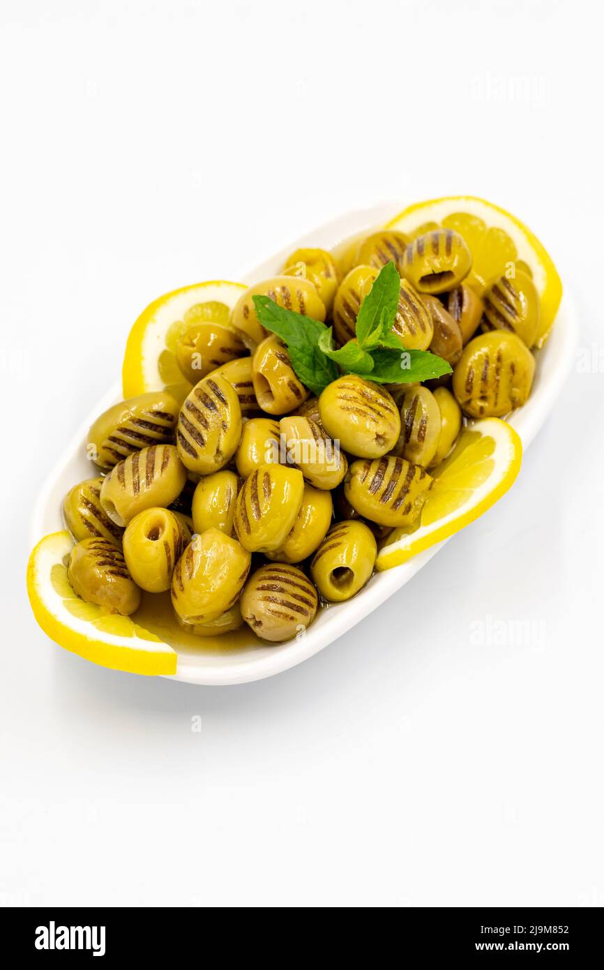Grilled green olives. natural olive on isolated white background ...
