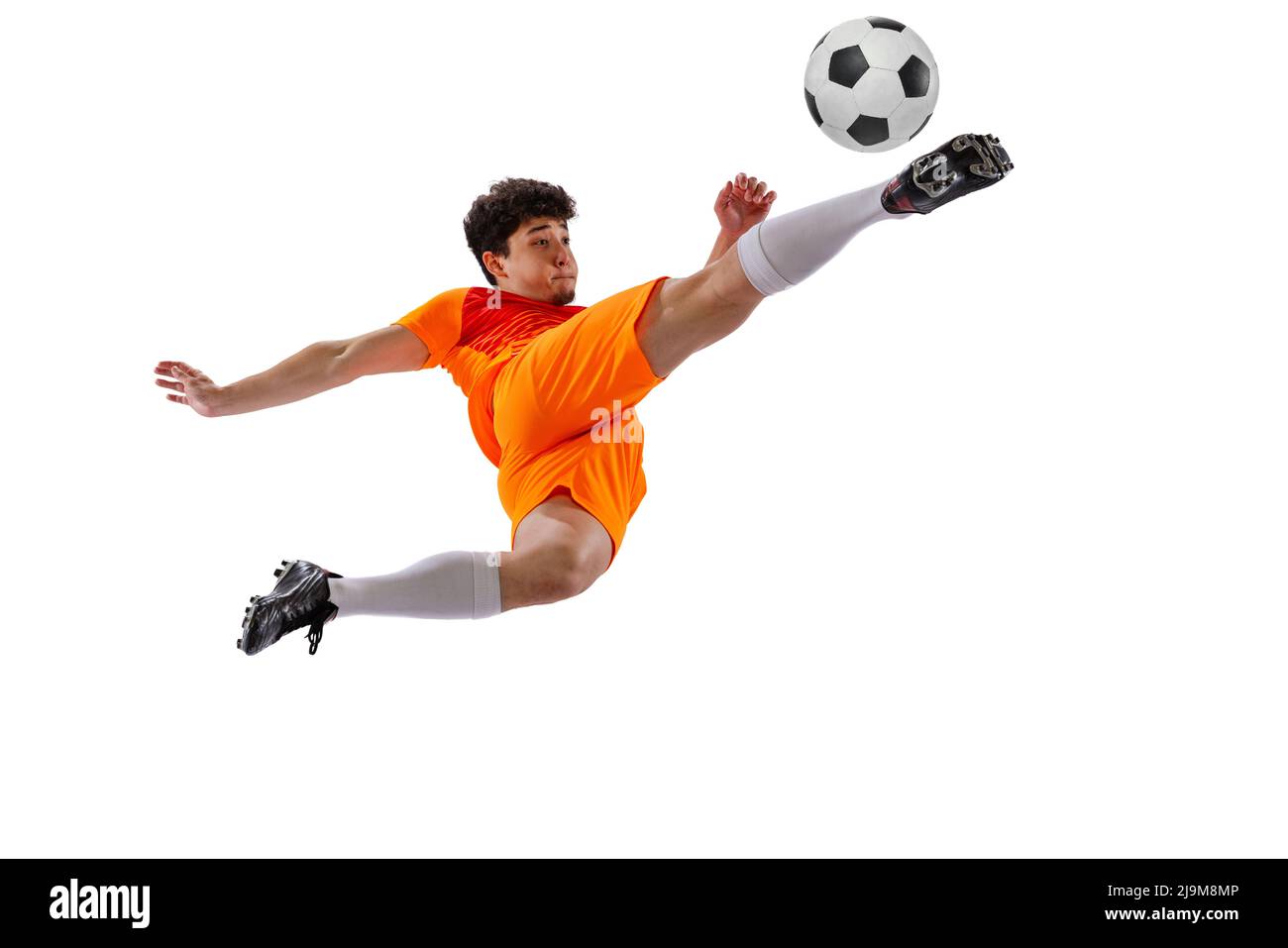 Professional football, soccer player in motion isolated on white studio ...