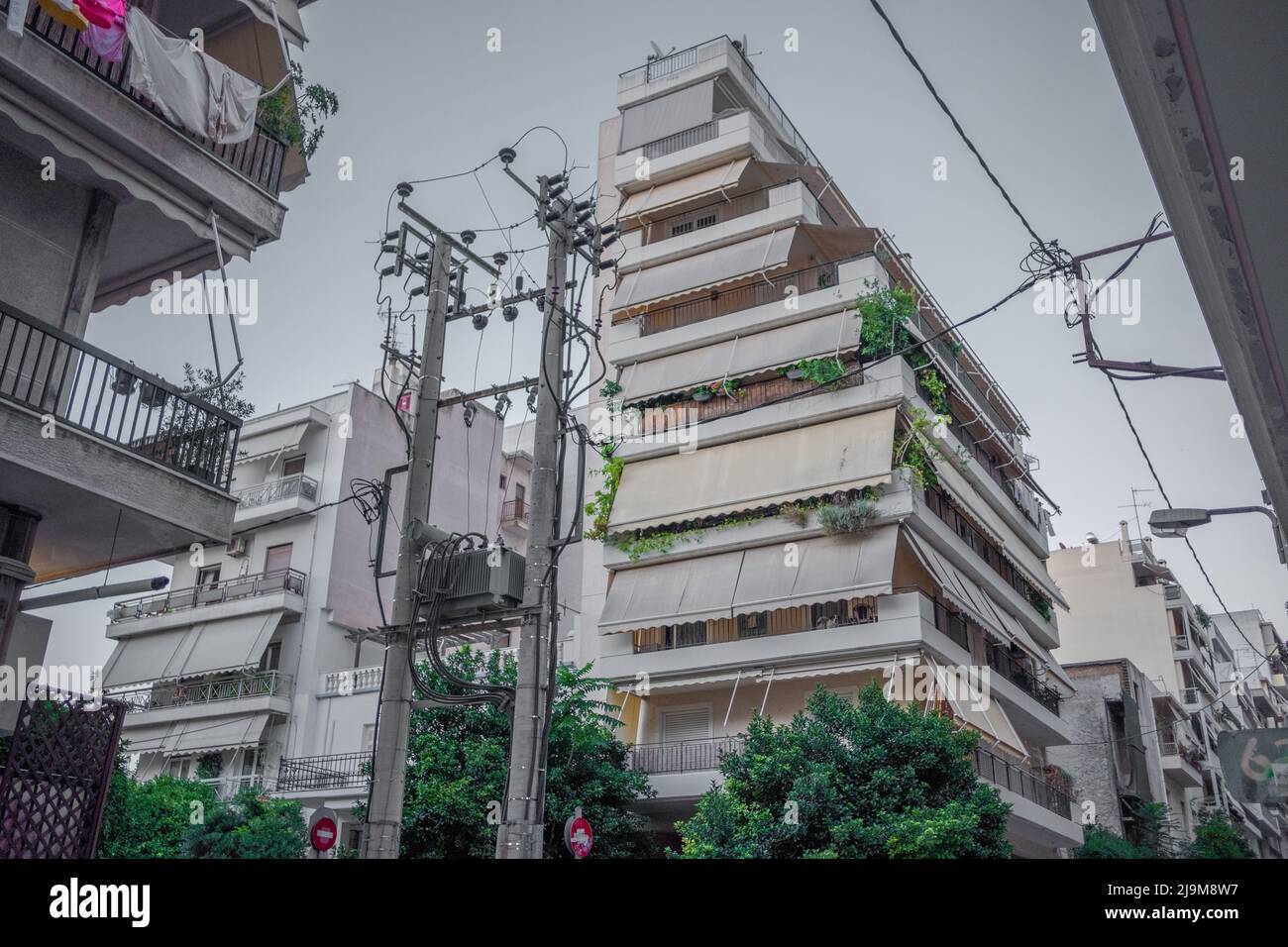 Typical apartment blocks in Athens. As the block rises the upper floors ...