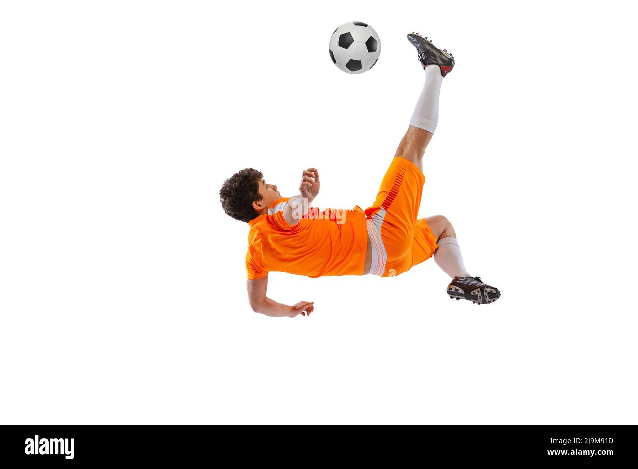 Professional football, soccer player in motion isolated on white studio ...