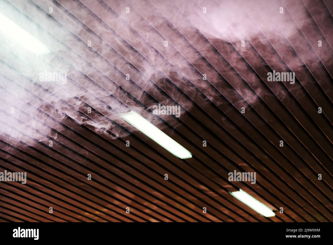 Arson smoke at hall ceiling as abstract background Stock Photo - Alamy