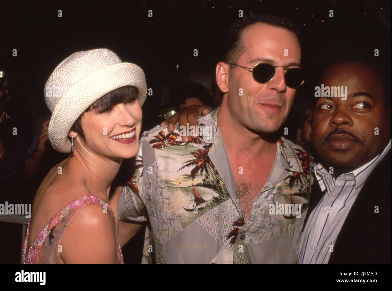 Bruce Willis and Demi Moore with Reginald VelJohnson at the "Die Hard 2 ...