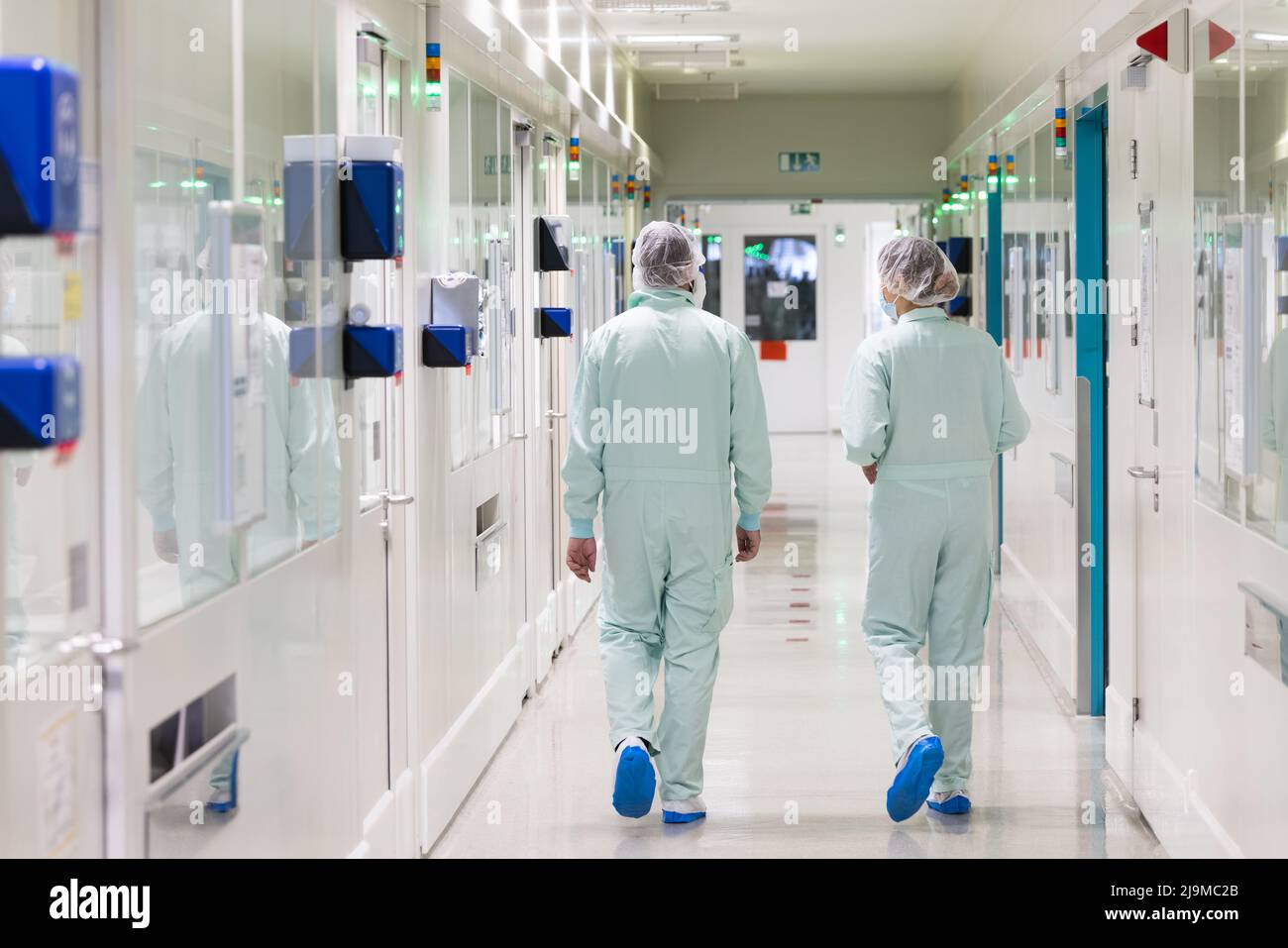 Freiburg Im Breisgau, Germany. 24th May, 2022. Two employees of Pfizer ...