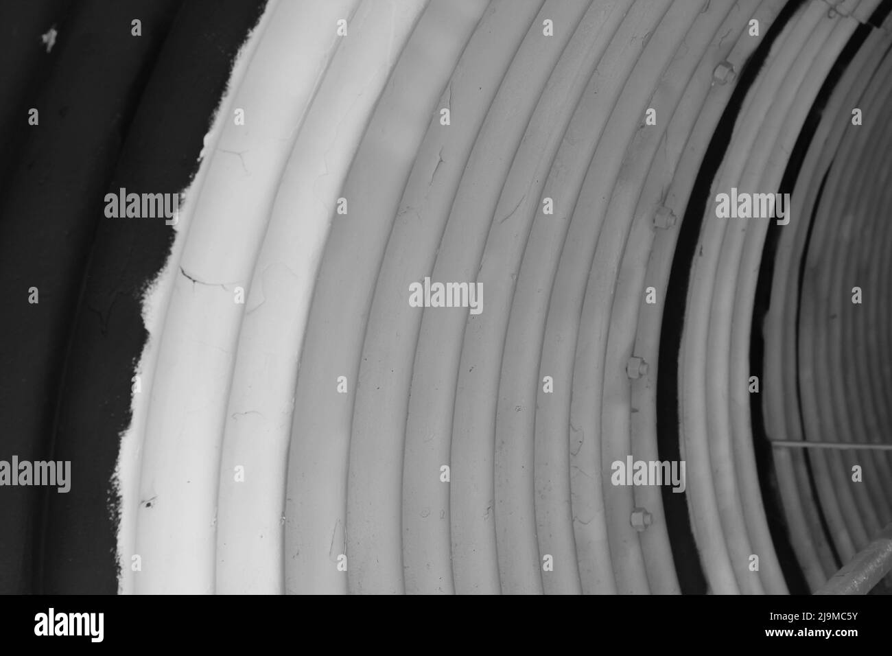 Painted corrugated steel tunnel in the big city Stock Photo - Alamy