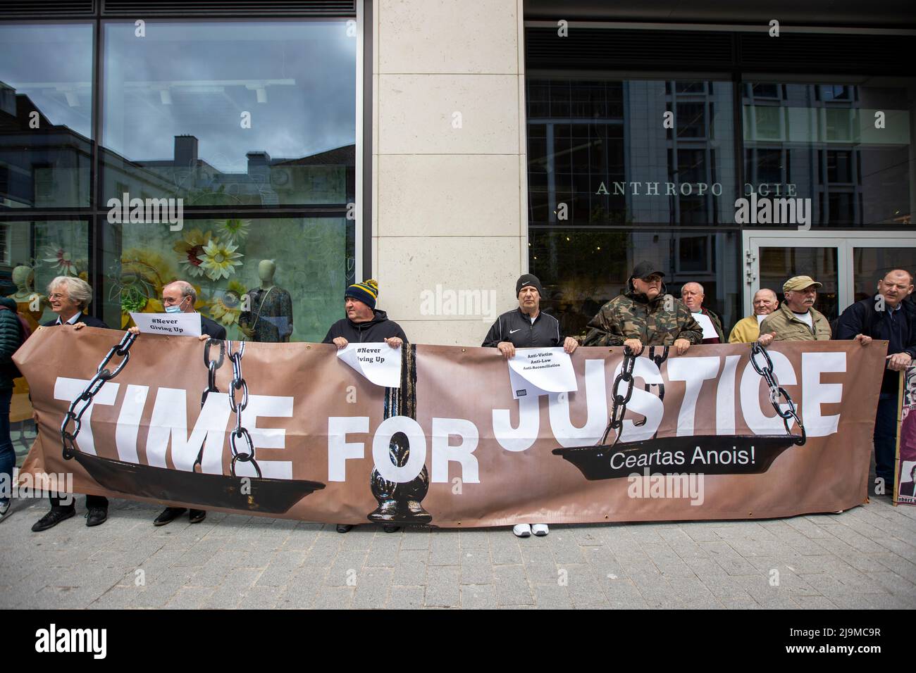 Protesters against the UK Government's Troubles Legacy Bill stands ...