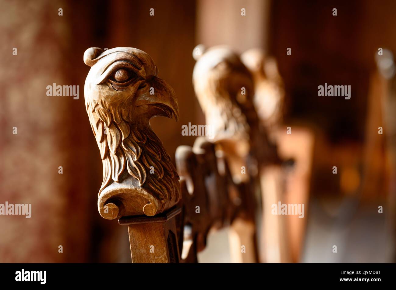 wooden chair with carved eagle in Tratzberg castle in Tyrol Stock Photo ...