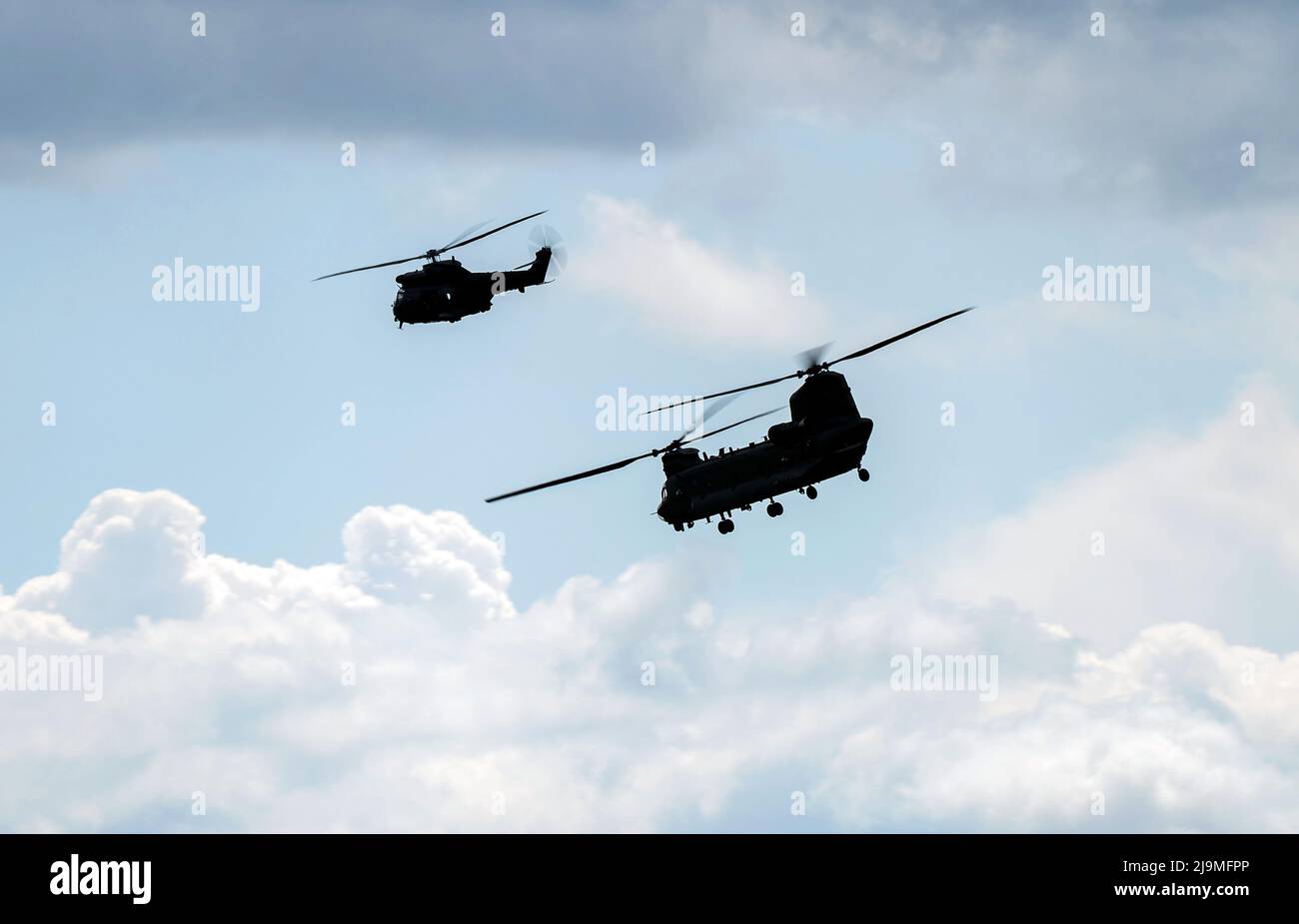An RAF Chinook and Puma take-off to return to base after aircraft from ...